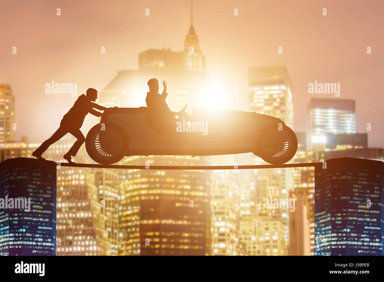 Teamwork concept with businessman pushing car Stock Photo - Alamy
