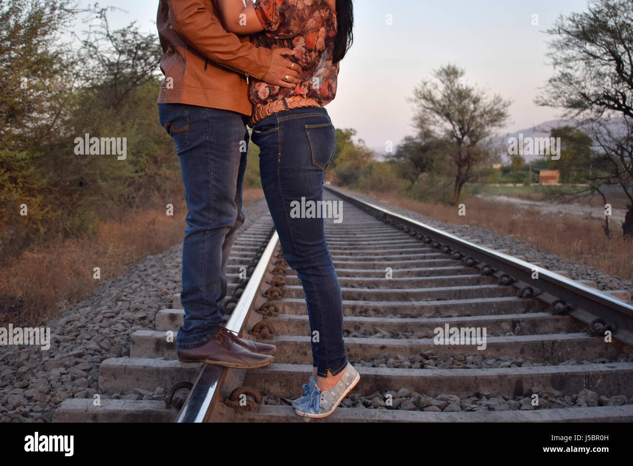 Railroad track couple picture,, Pune, Maharashtra Stock Photo - Alamy