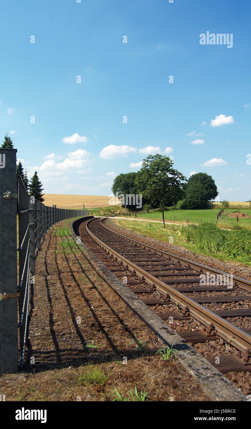 fence bend railway rails train track scenery countryside nature shaddow ...