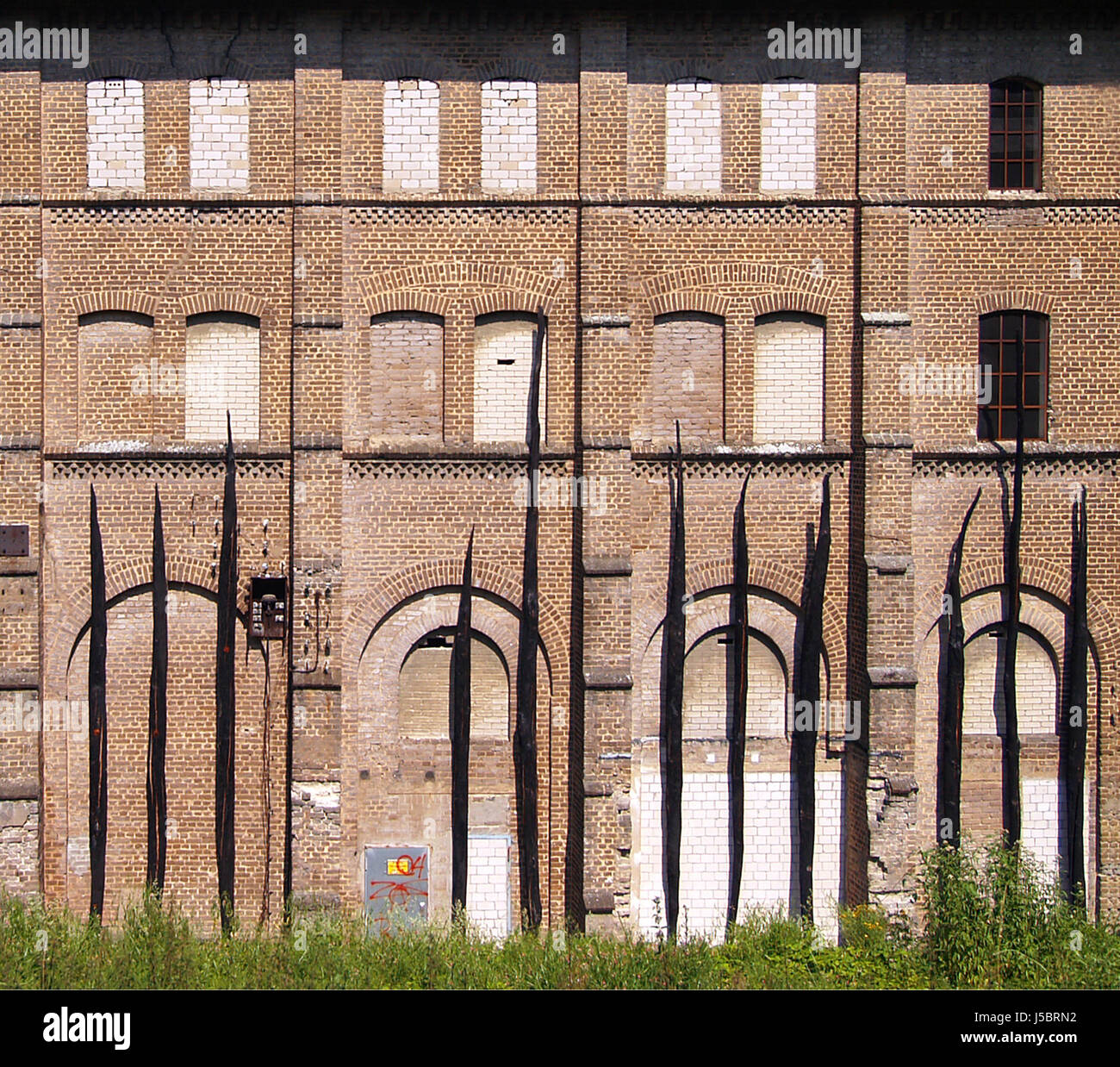 memorial window porthole dormer window pane closed burnt burned bricked ...