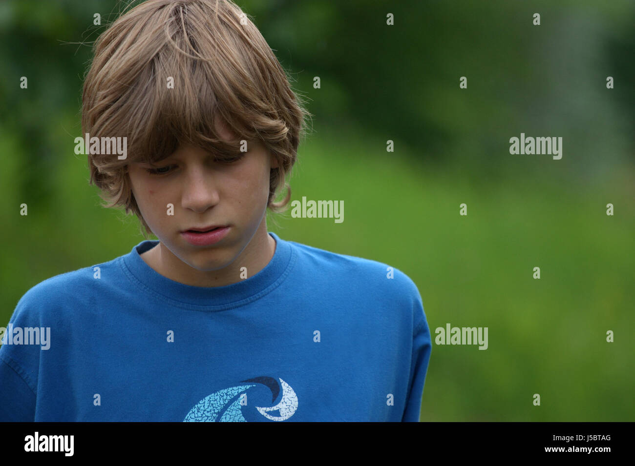 sad teenage boy Stock Photo - Alamy