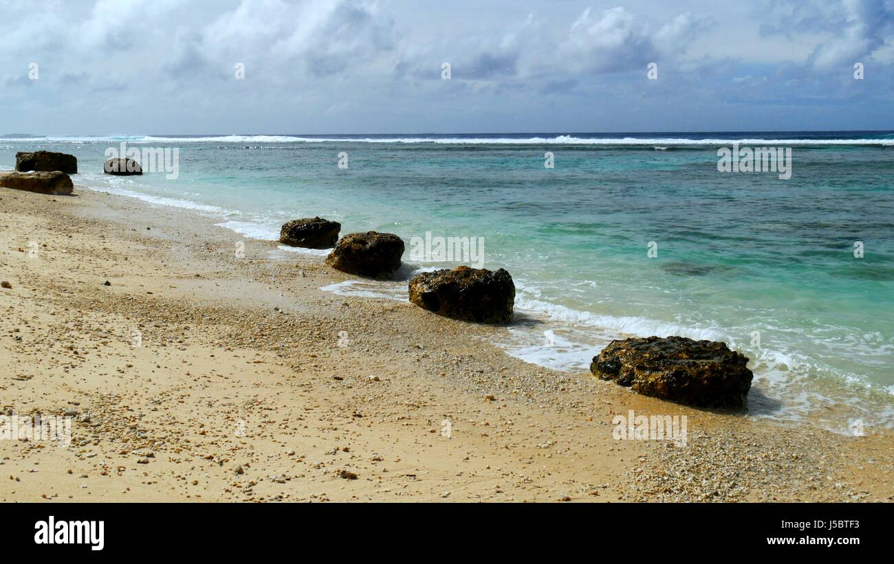 Wing Beach, Saipan Even on a gloomy day, Wing Beach entices one to swim ...