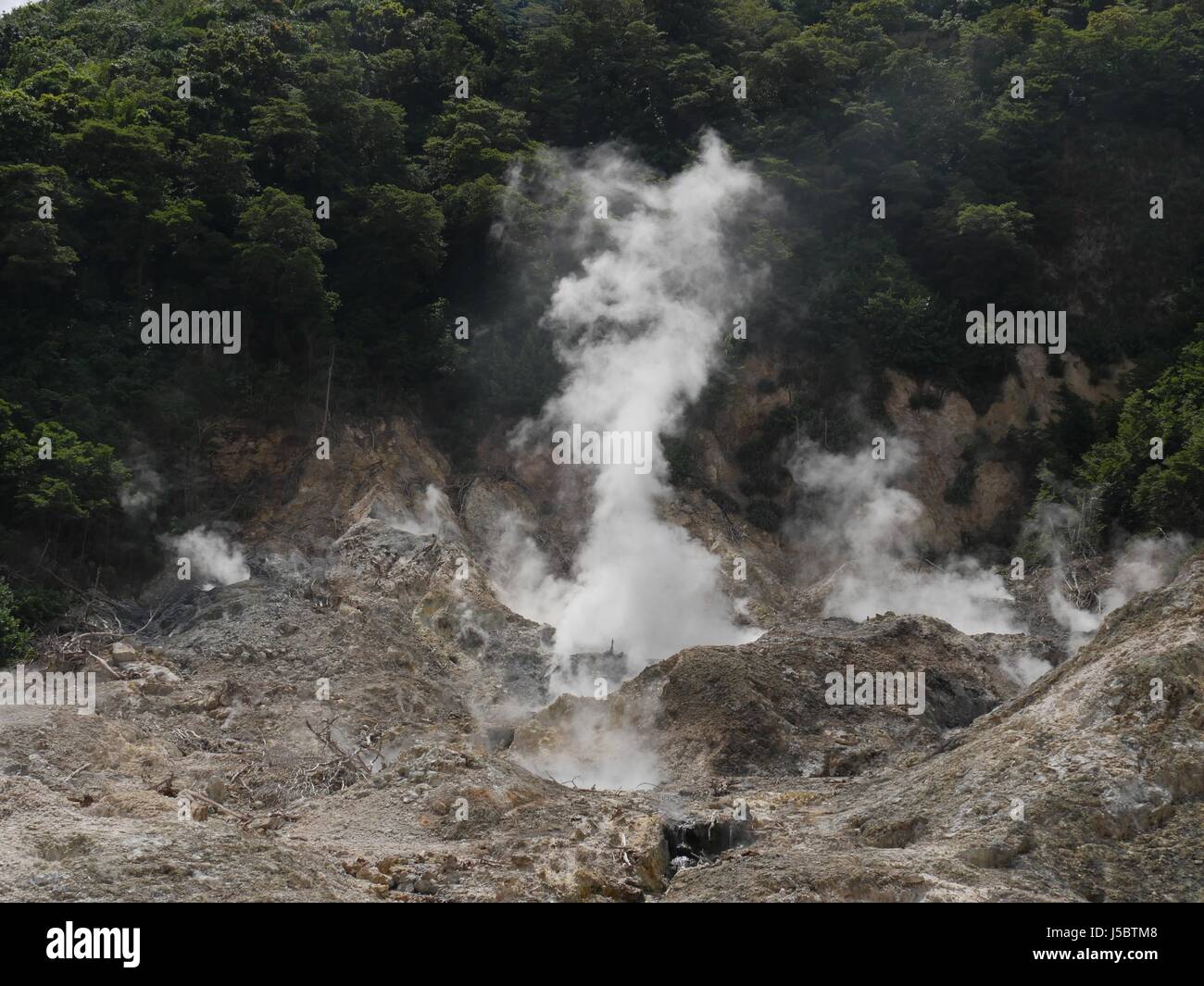 Sulphur Spring and drive-thru volcano, St Lucia Smoke rising is seen ...