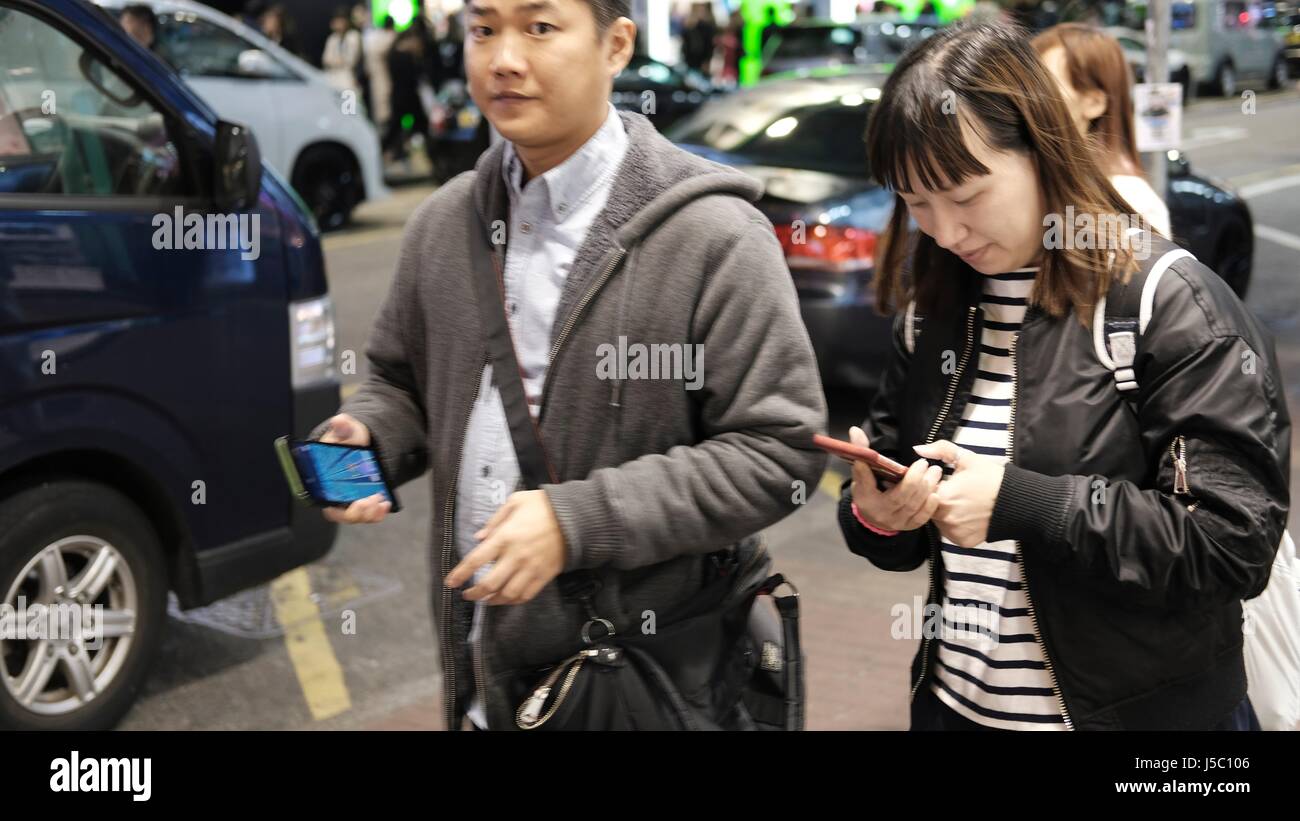 Pedestrian People in Public Using Mobile Cell Phones for Communication ...