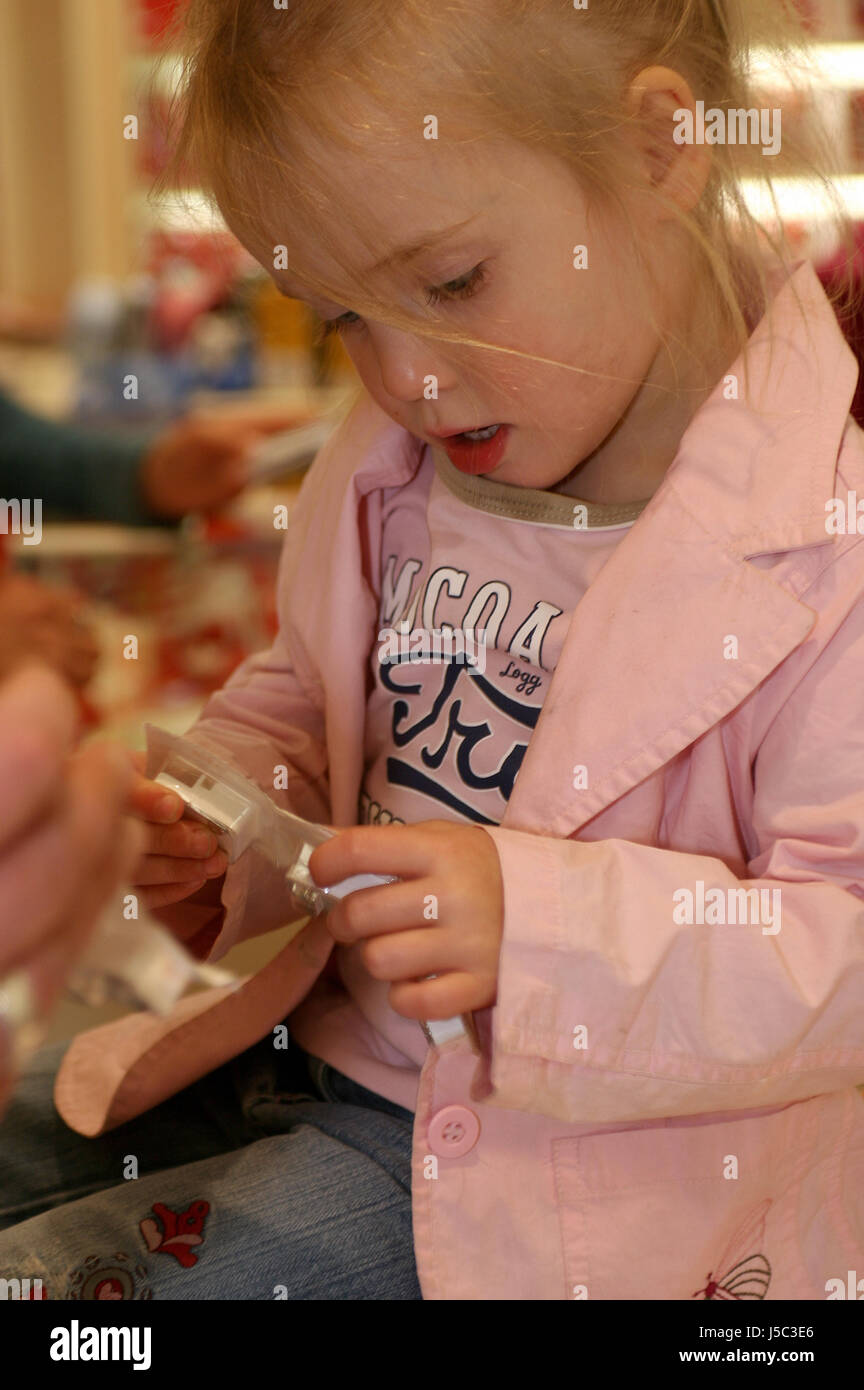 the first earrings Stock Photo - Alamy