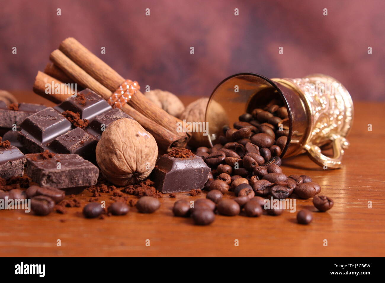 Chocolate, cinnamon, walnut and coffee bean Stock Photo - Alamy