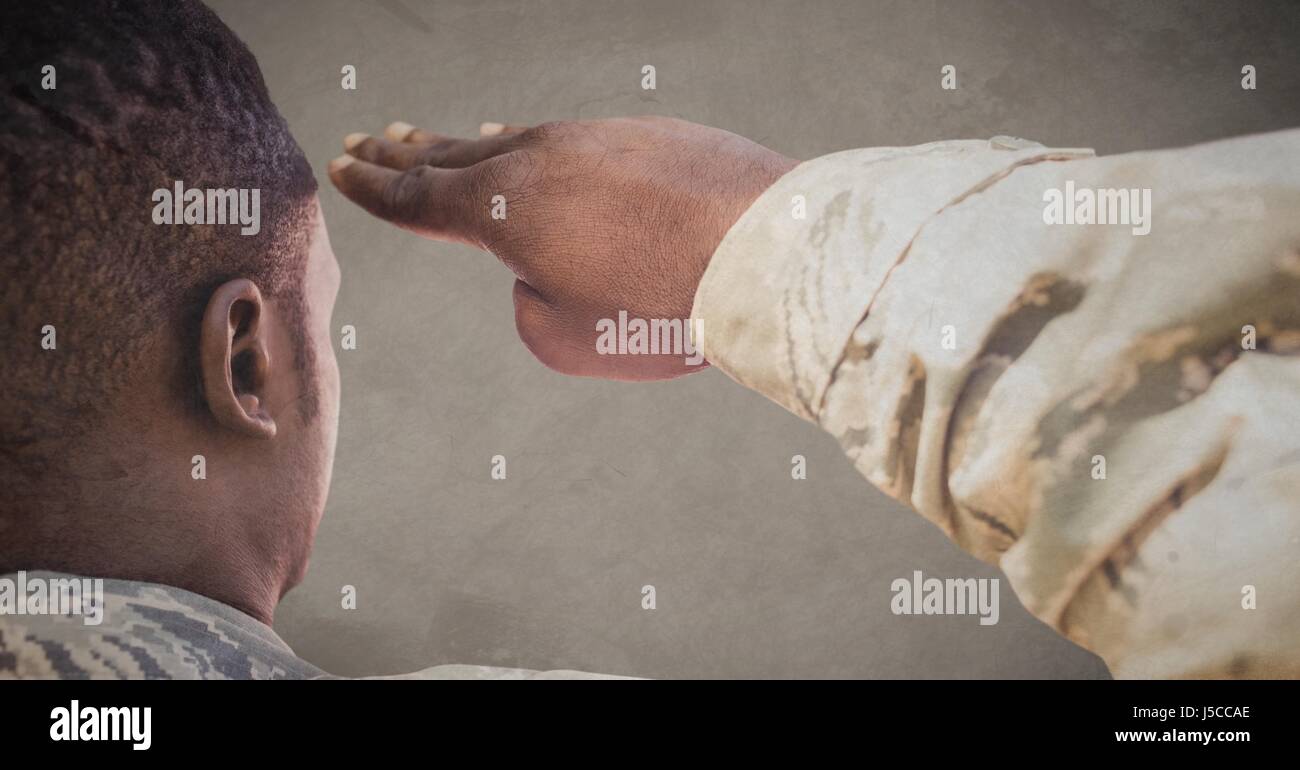 Digital composite of Back of soldier saluting against brown background ...