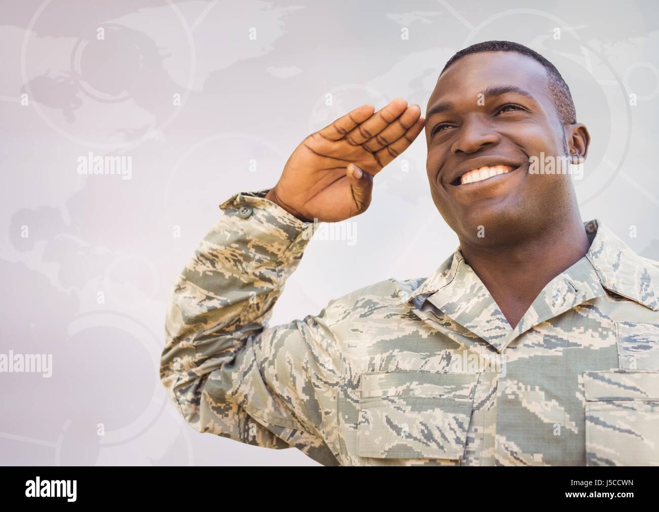Digital composite of Soldier smiling and saluting against white map ...