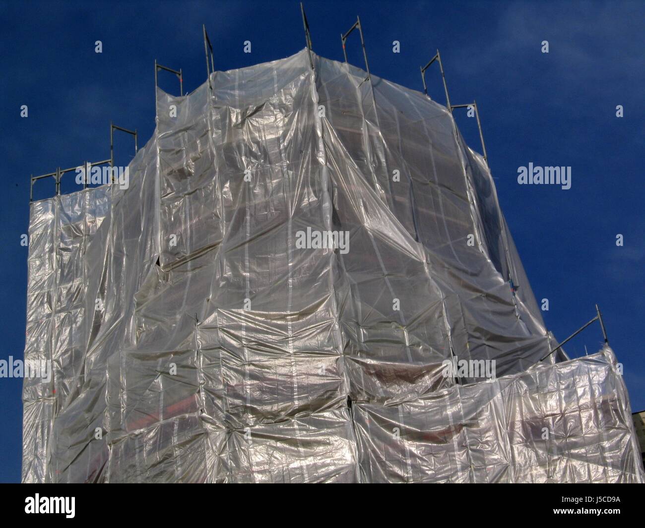 Scaffolding veiled hi-res stock photography and images - Alamy