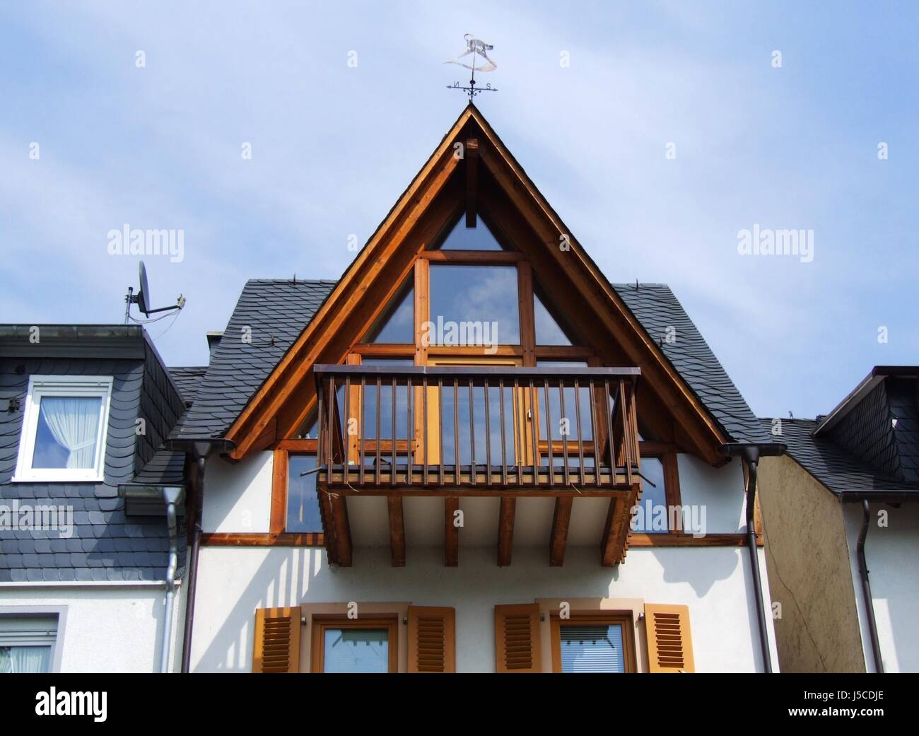 gable with balcony Stock Photo - Alamy