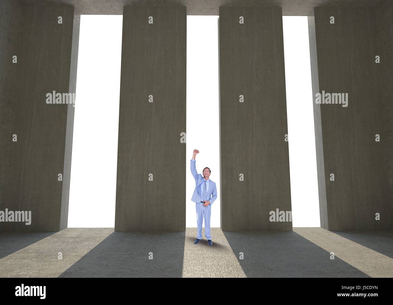 Digital composite of Successful businessman standing against columns ...