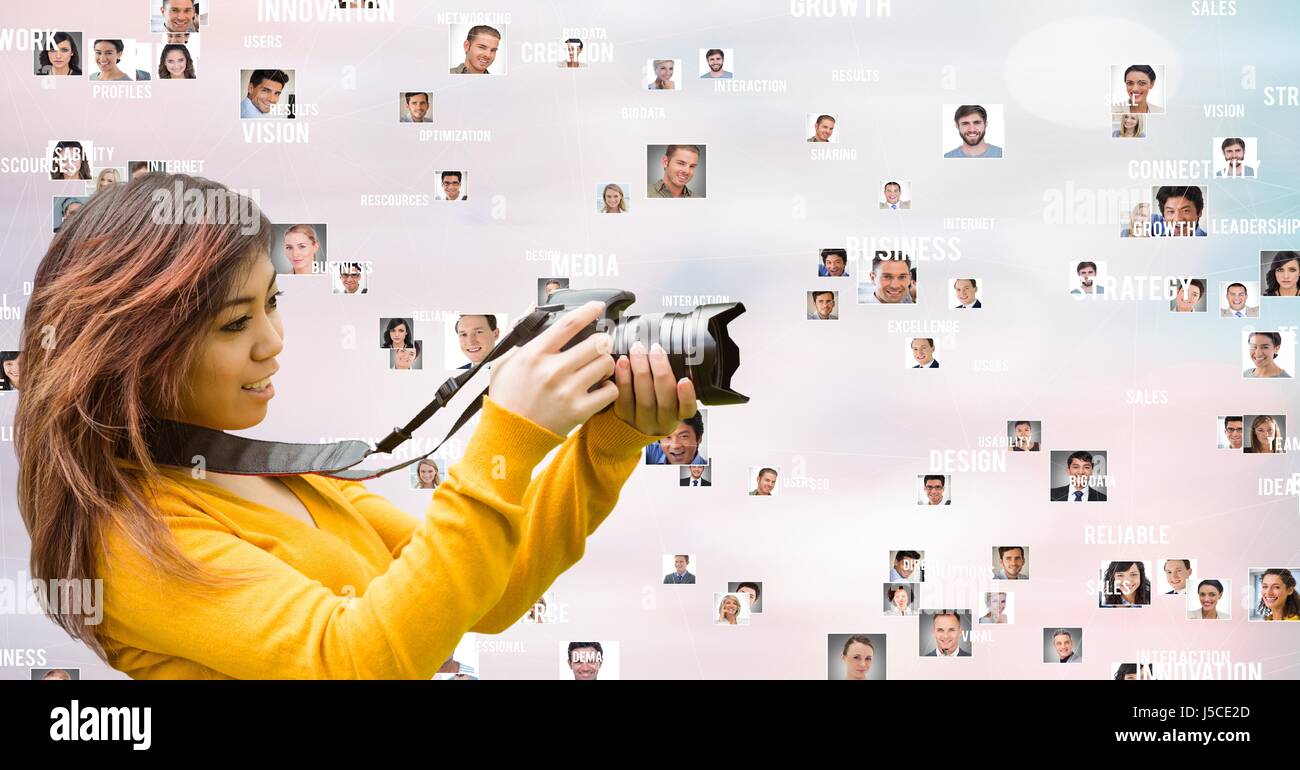 Digital composite of Photographer with flying portraits Stock Photo - Alamy