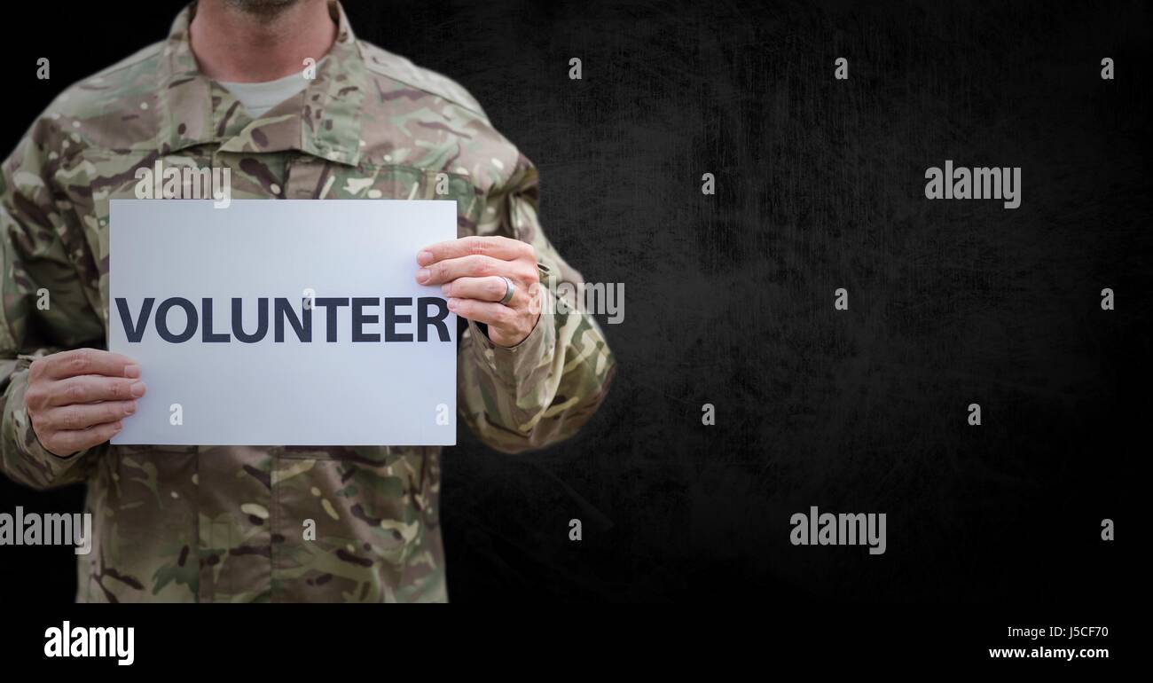 Digital composite of Soldier volunteer mid section against black ...