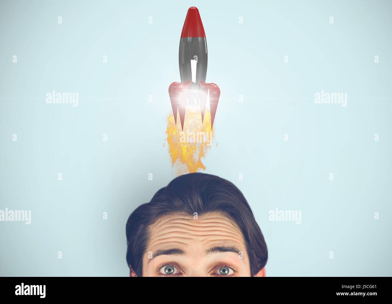 Digital composite of Portrait of man with rocket over head Stock Photo ...