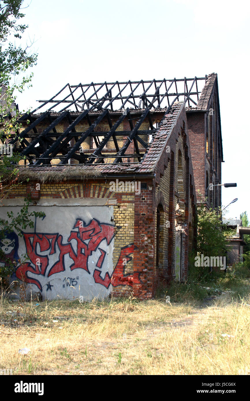 daub graffiti grafitti ruin wrecks roof beam burnt burned burnt down ...