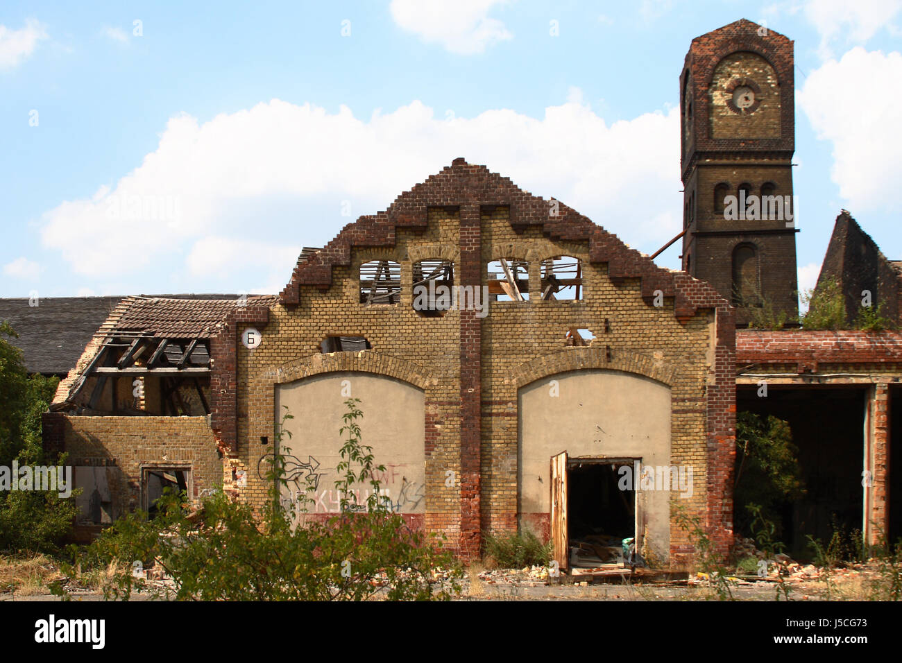 tower daub graffiti grafitti ruin wrecks roof beam burnt burned clock ...