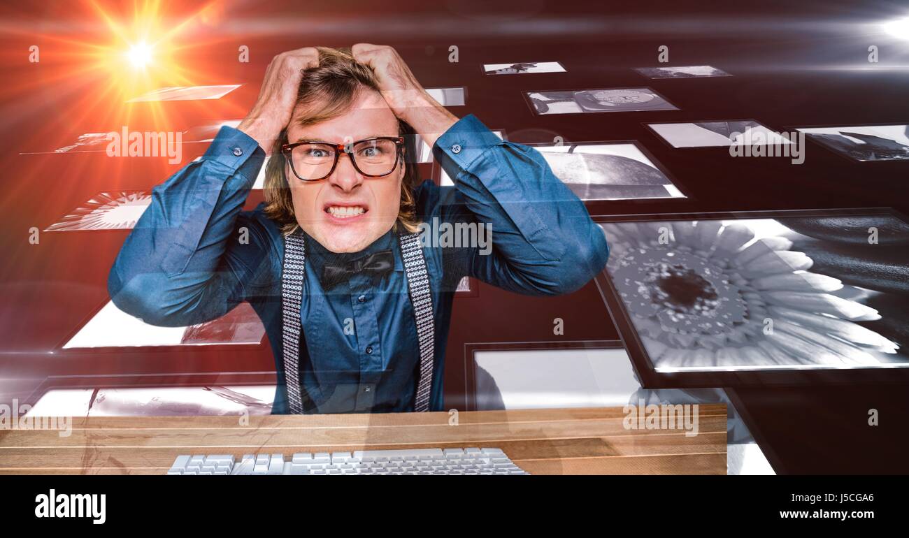 Digital composite of Frustrated hacker pulling hair Stock Photo - Alamy