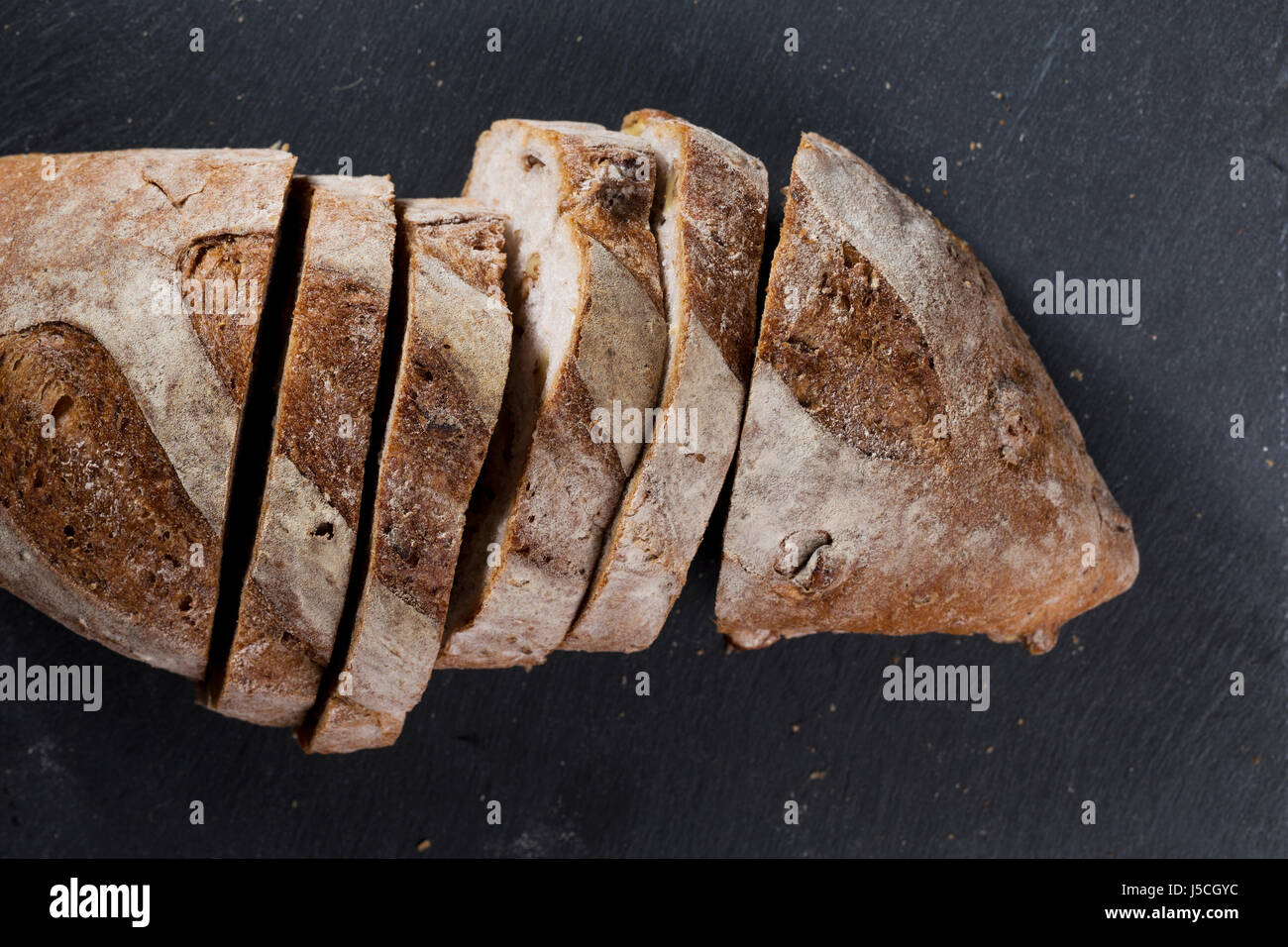 Artisan whole grain bread sliced hi-res stock photography and images ...