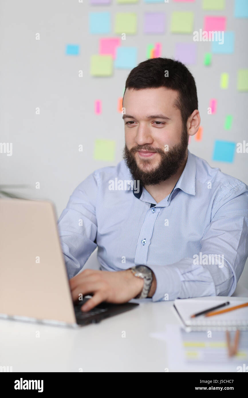 Man at work in the office Stock Photo - Alamy