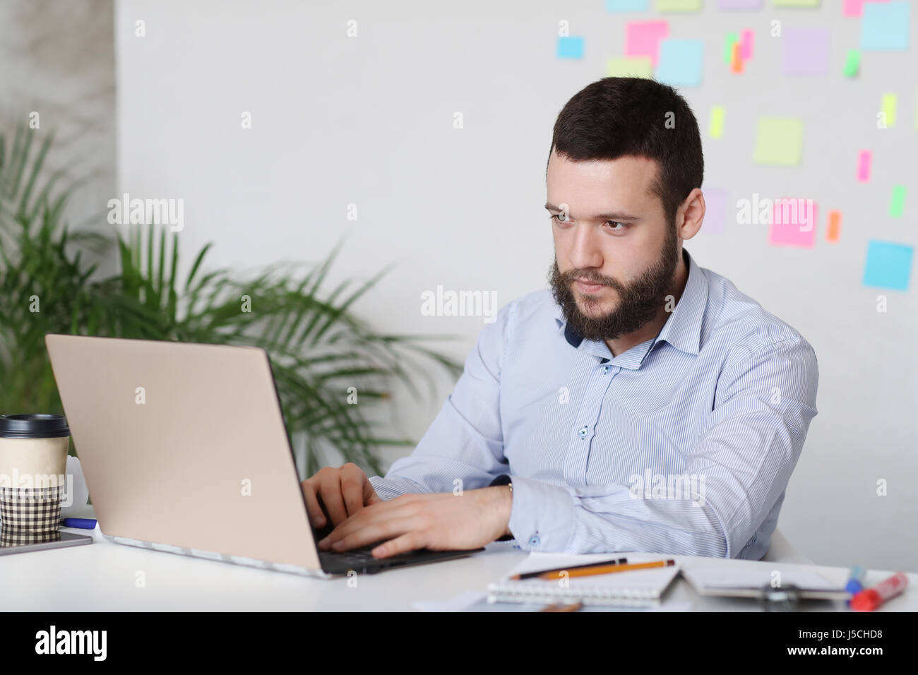Man at work in the office Stock Photo - Alamy