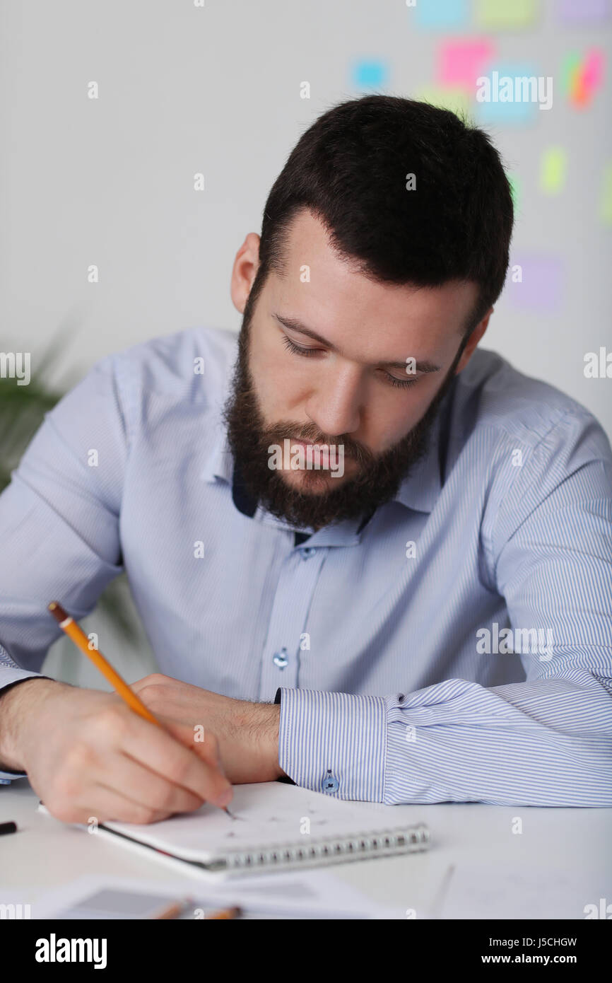 Man at work in the office Stock Photo - Alamy