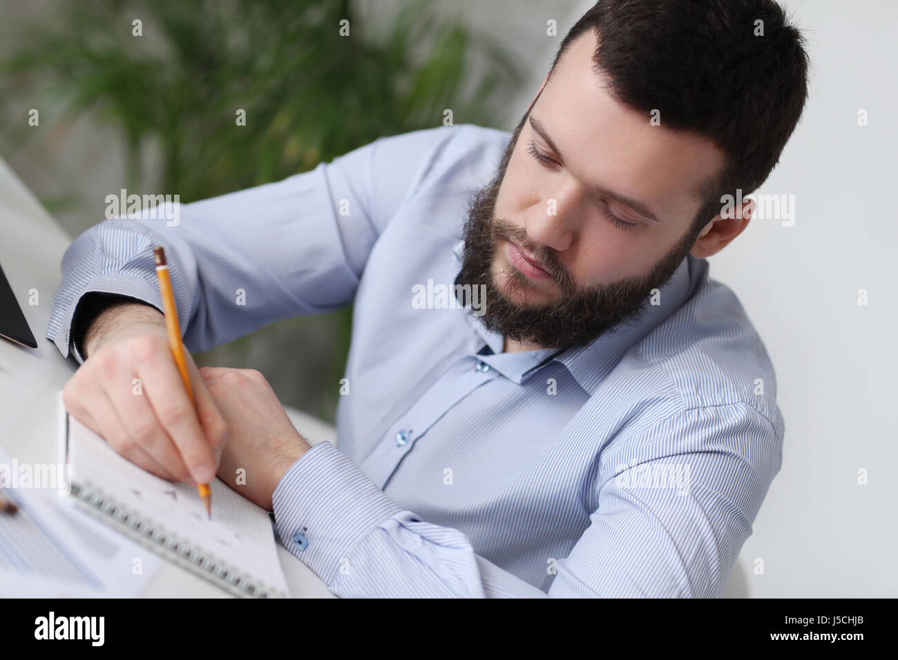 Man at work in the office Stock Photo - Alamy