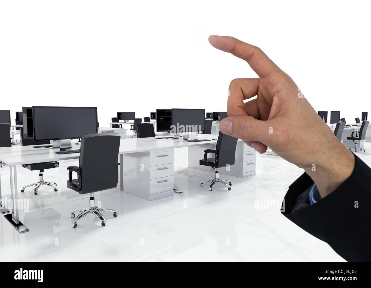 Digital composite of Hand pointing in air of computer desks office ...