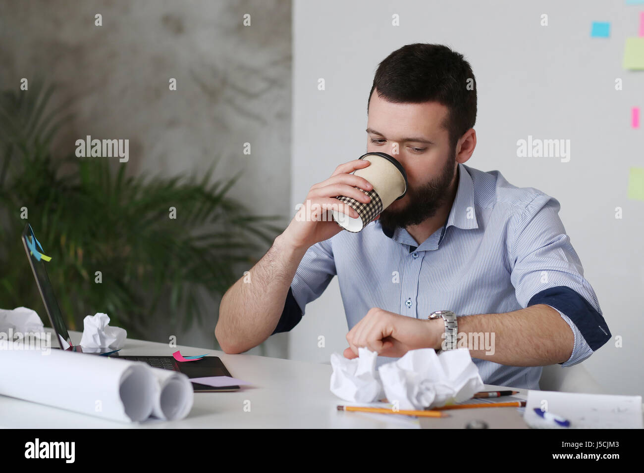 Man at work in the office Stock Photo - Alamy