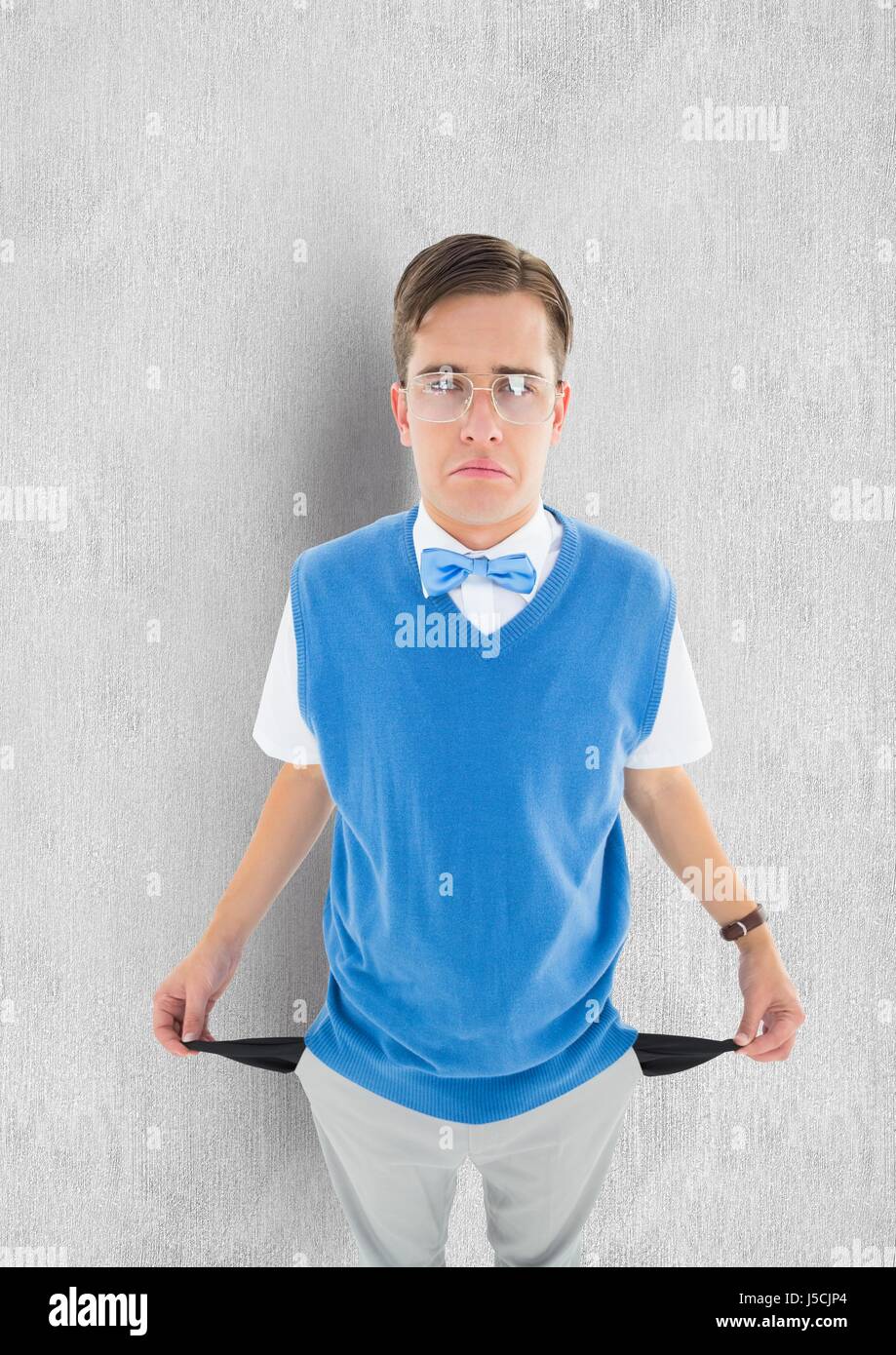Digital composite of Sad man showing empty pockets against wall Stock ...