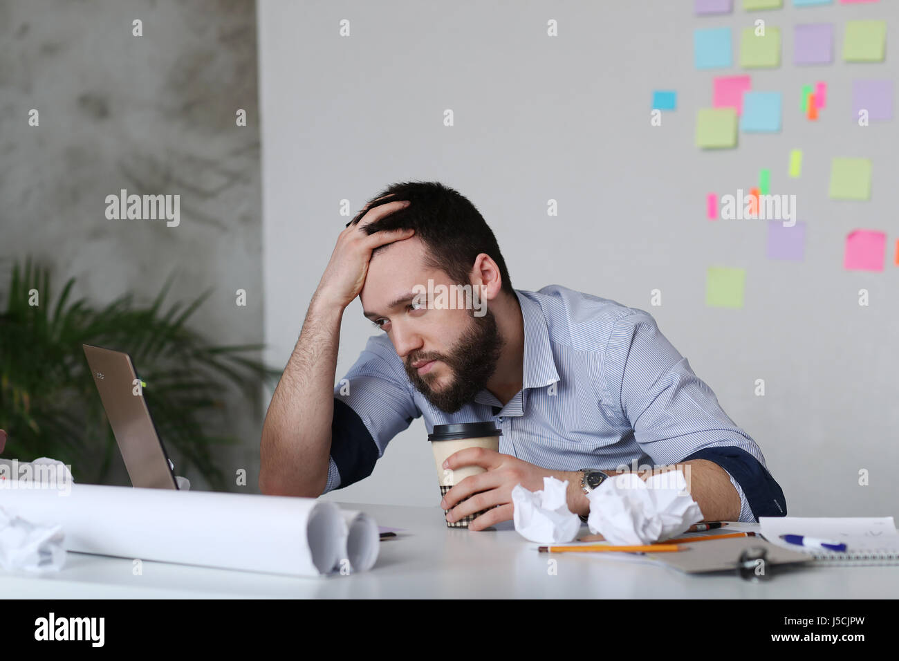 Man at work in the office Stock Photo - Alamy