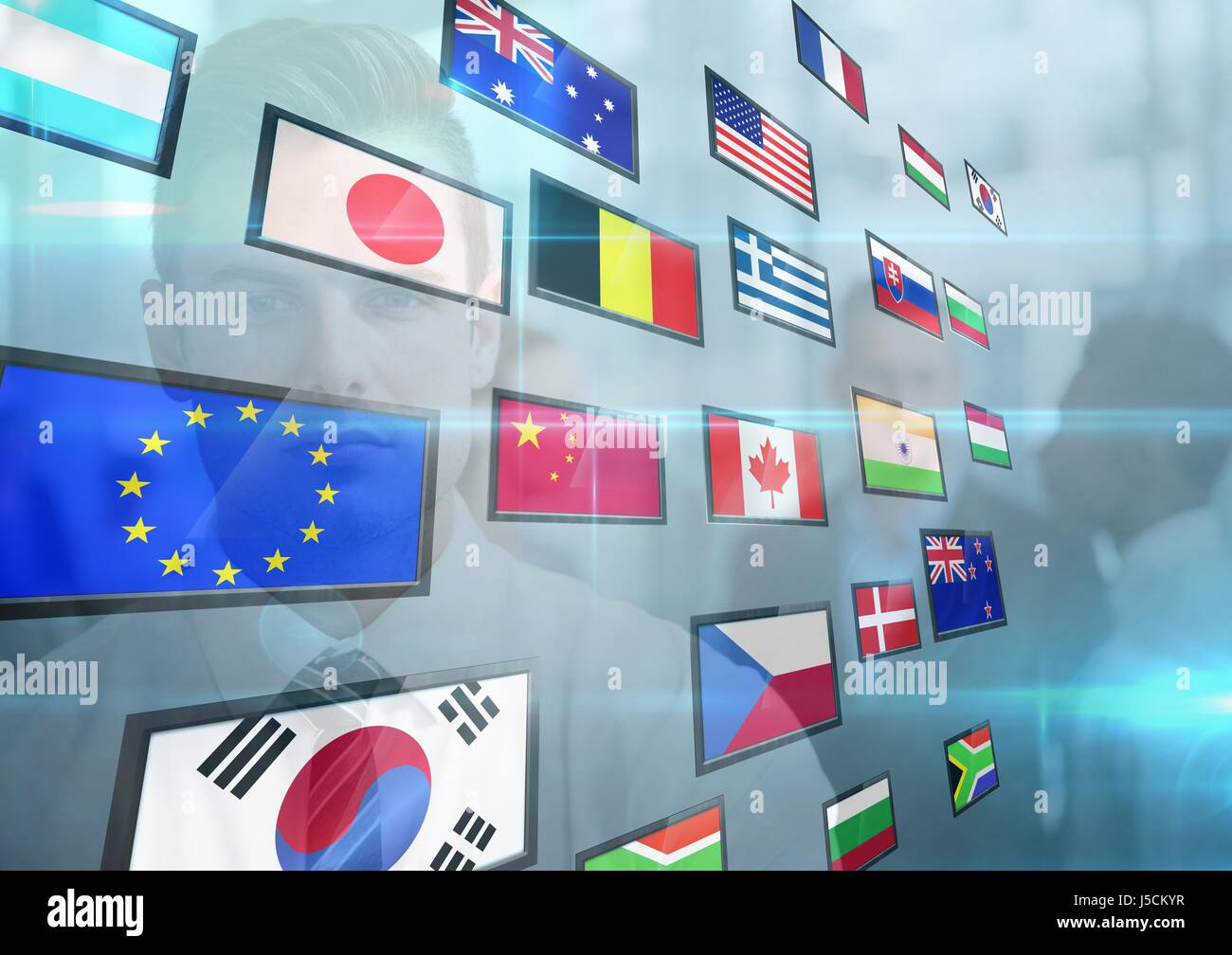 Digital composite of panel with flags and young business man back Stock ...