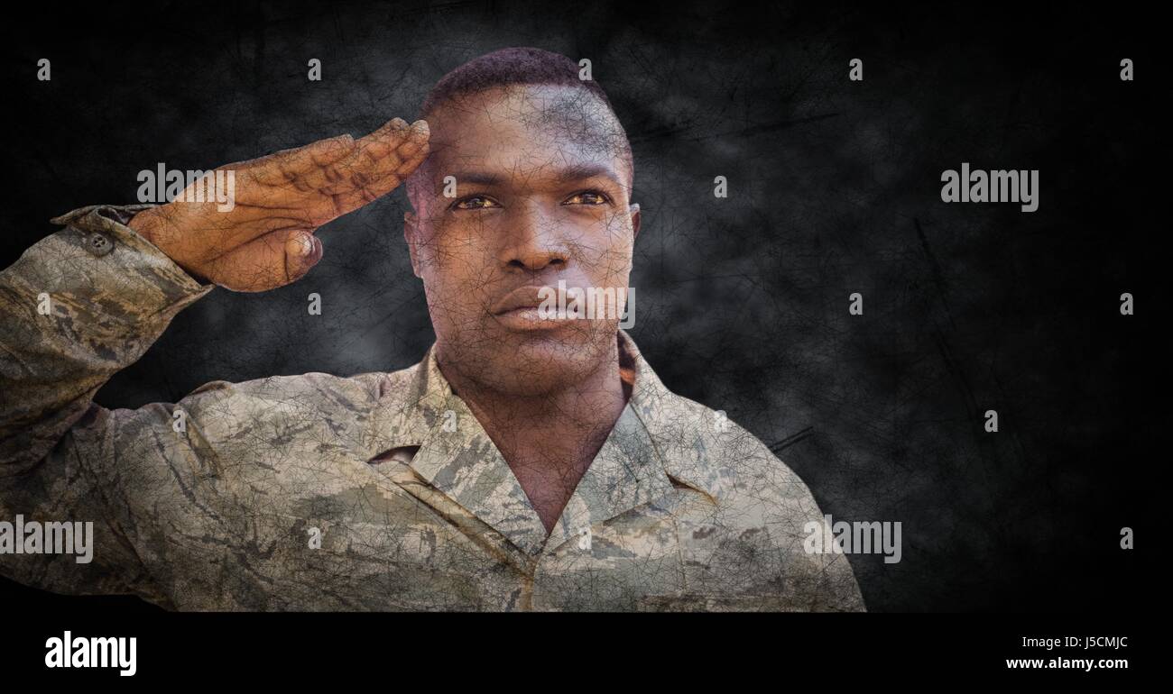 Digital composite of Soldier saluting with black grunge background and ...