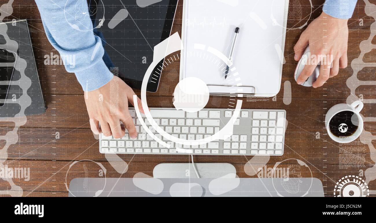 Digital composite of Hands using computer with overlays Stock Photo - Alamy