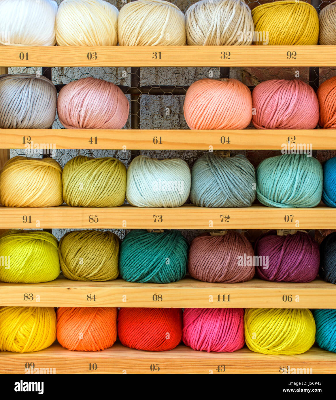 colorful balls wool in a wooden box Stock Photo - Alamy