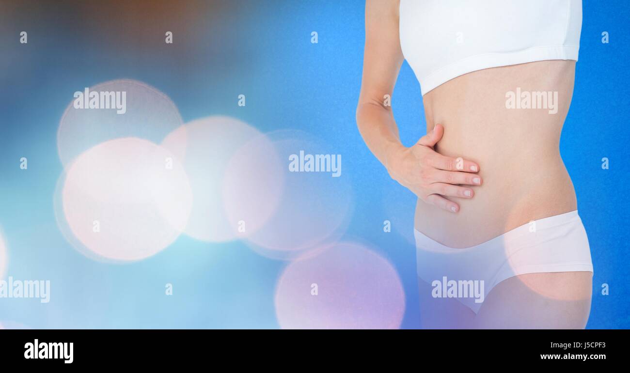 Digital composite of Midsection of woman touching stomach Stock Photo ...