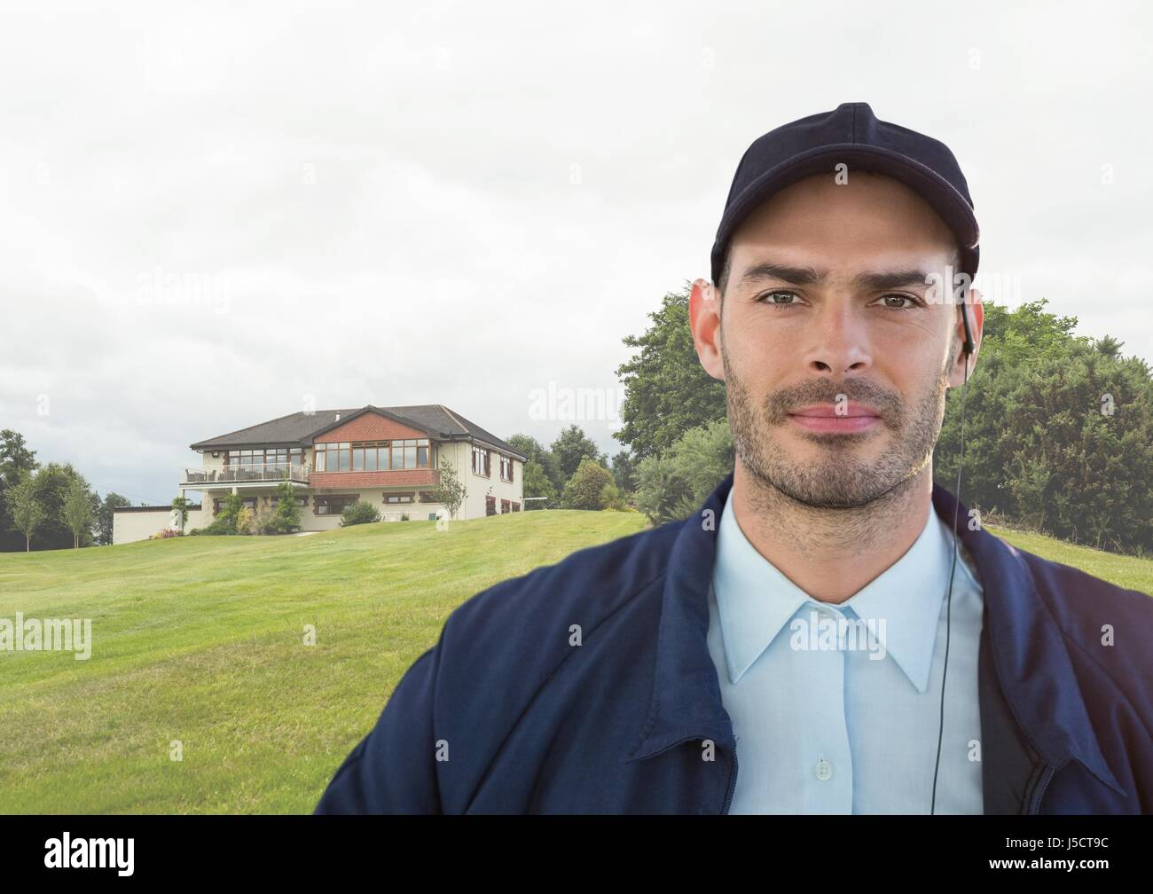 Digital composite of Portrait of security guard against house Stock ...