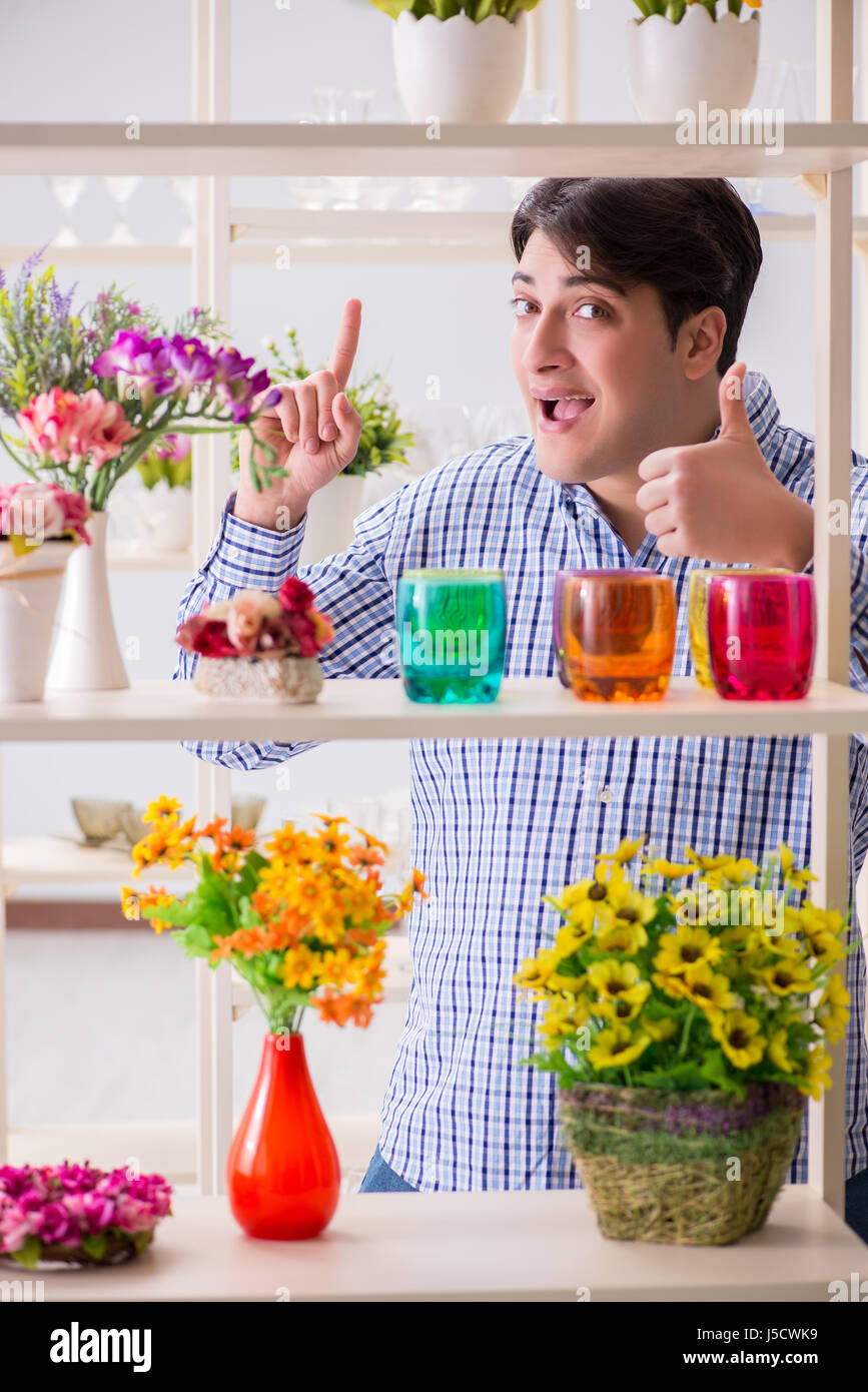 Young handsome man shopping in shop Stock Photo - Alamy