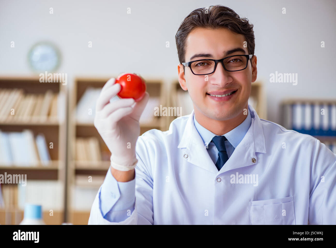 Scientist working on organic fruits and vegetables Stock Photo - Alamy
