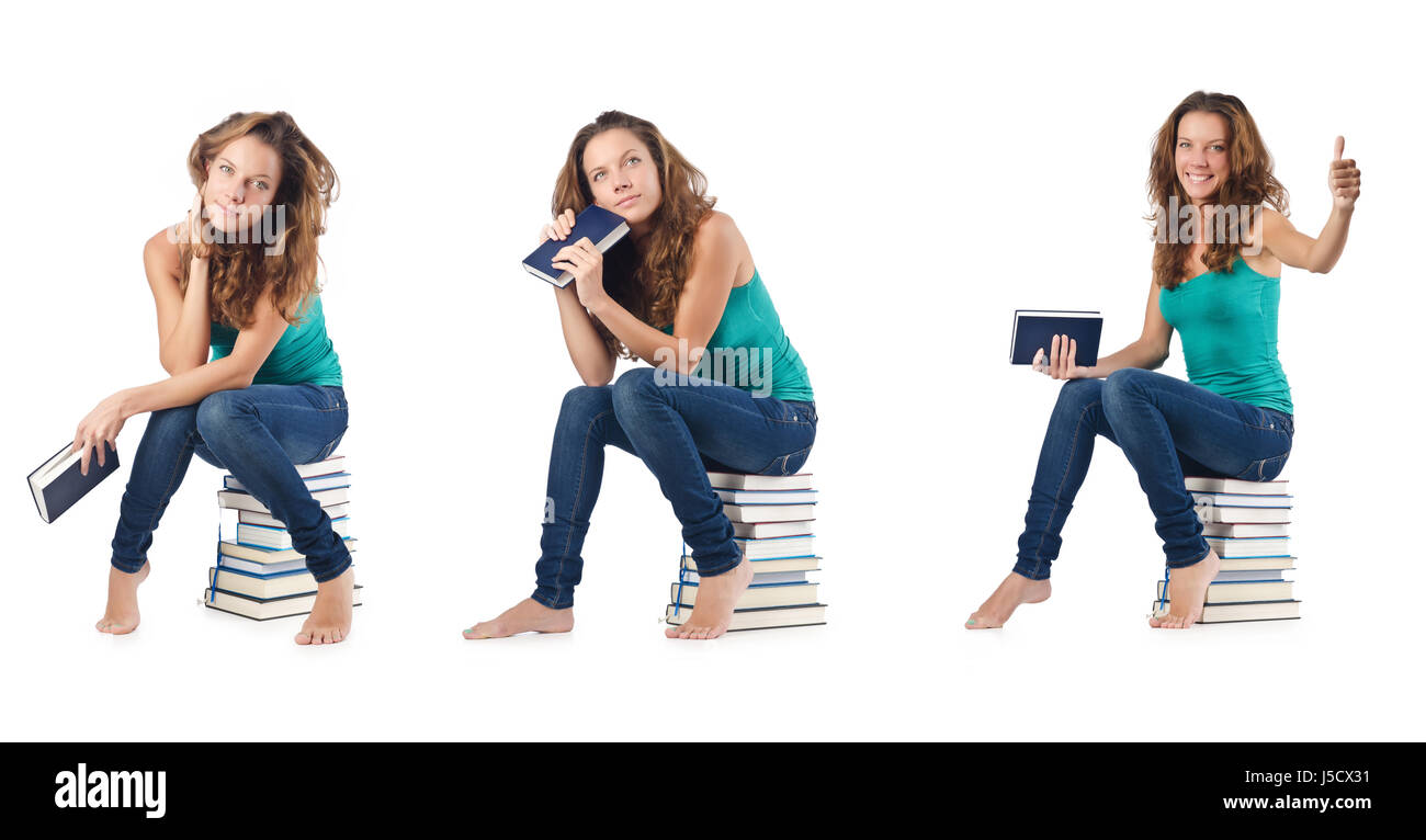 Student sitting on stack of books Stock Photo - Alamy