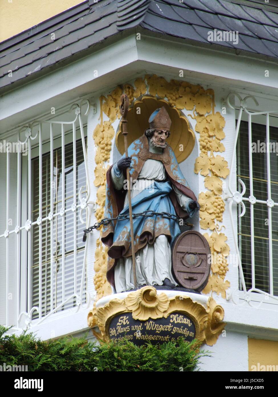 blue house building sculpture saint representation explanation ...