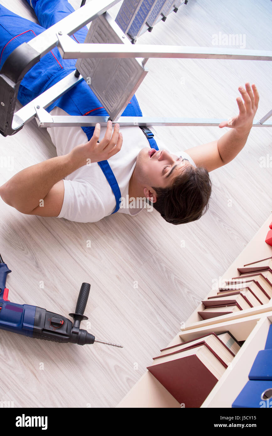 Unsafe behavior concept with falling worker Stock Photo - Alamy