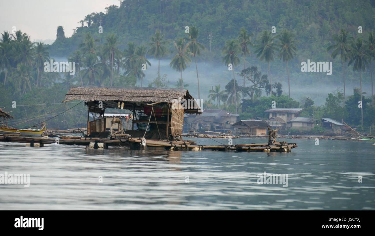 A crudely built hut in the middle of the lagoon serves as fishermen’s ...