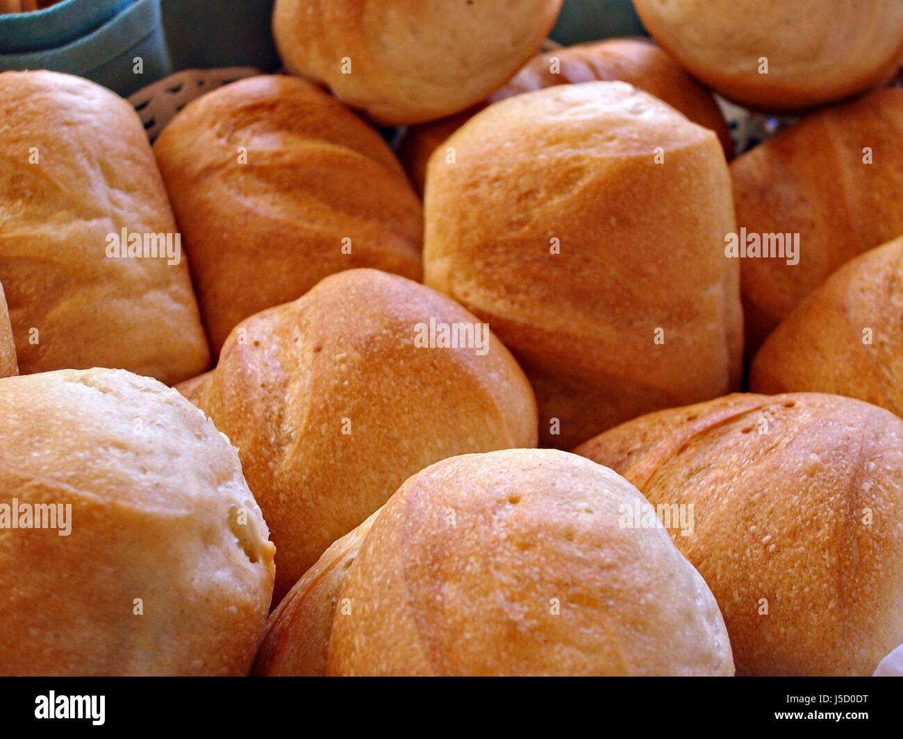 A tray of freshly baked bread ready to eat Stock Photo - Alamy