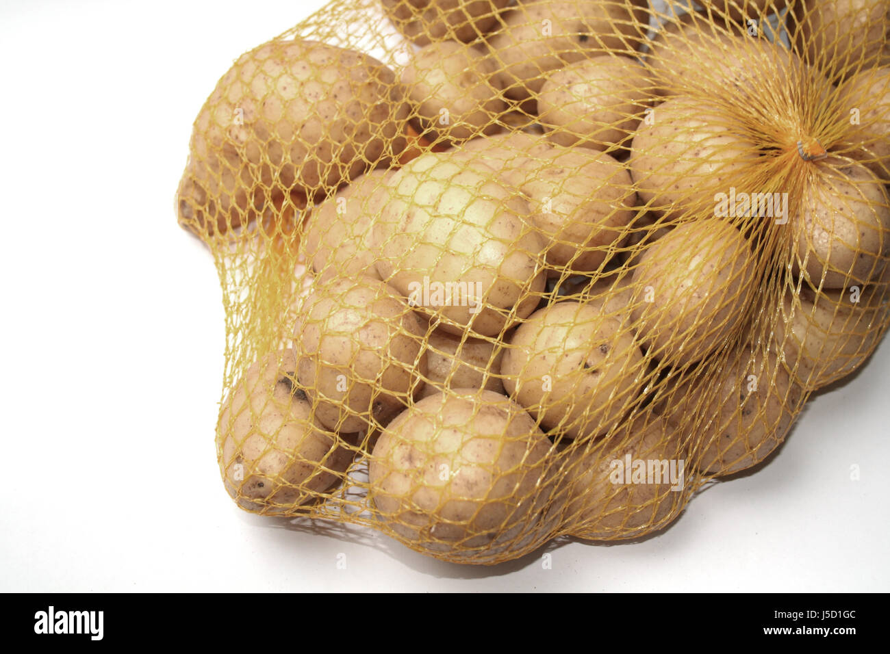 potatoes in a net Stock Photo - Alamy