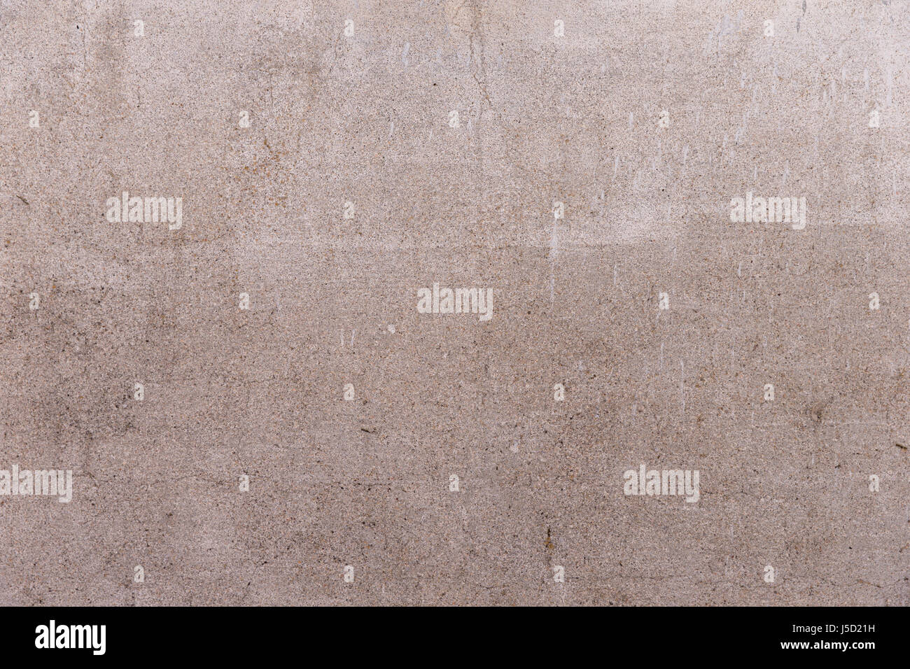 Grey concrete wall with traces in close-up Stock Photo - Alamy