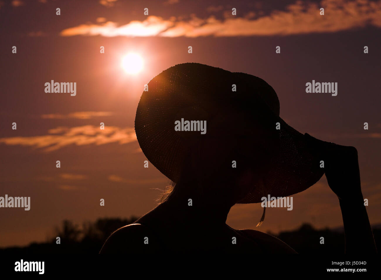 woman emotions sunset hat longing outlines evening tendency silhouette ...