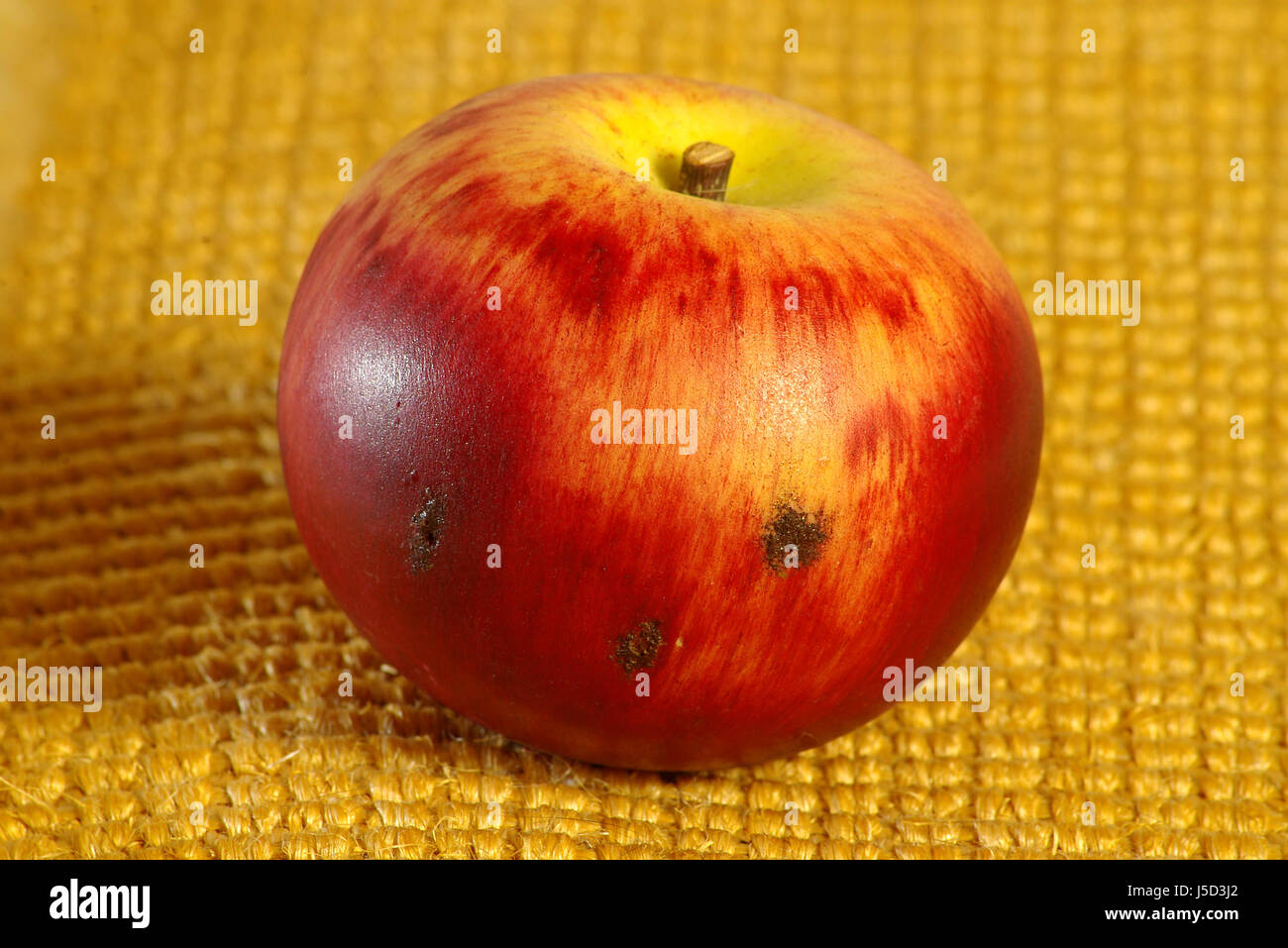 apple with hole Stock Photo - Alamy