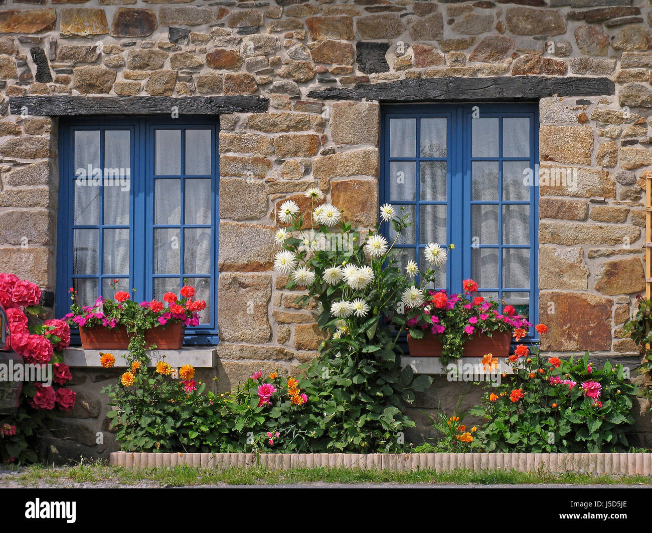 window porthole dormer window pane flower flowers plant france brittany ...