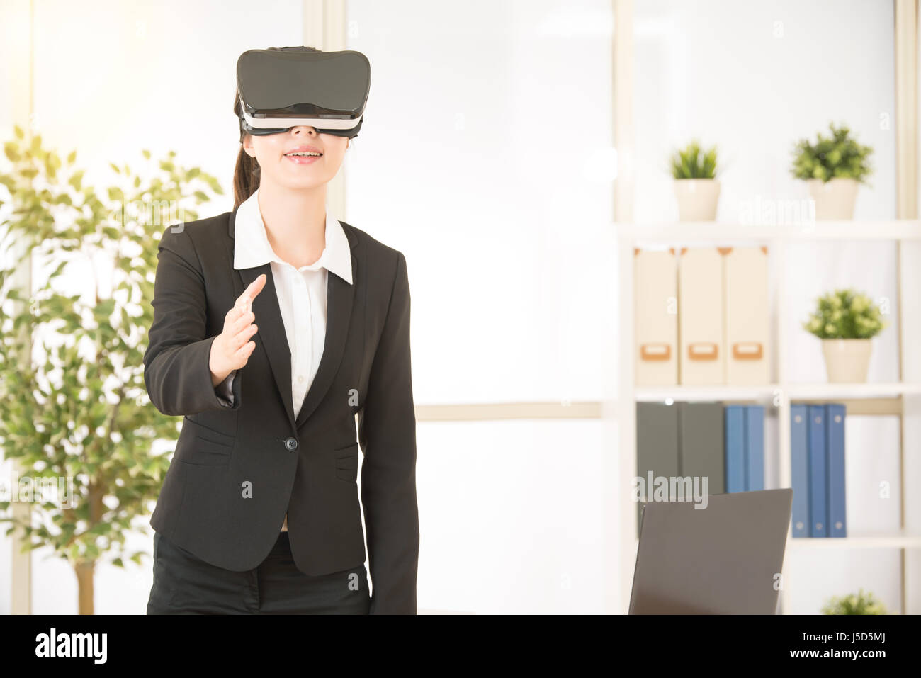 asian business woman showing handshake gesture by virtual reality ...