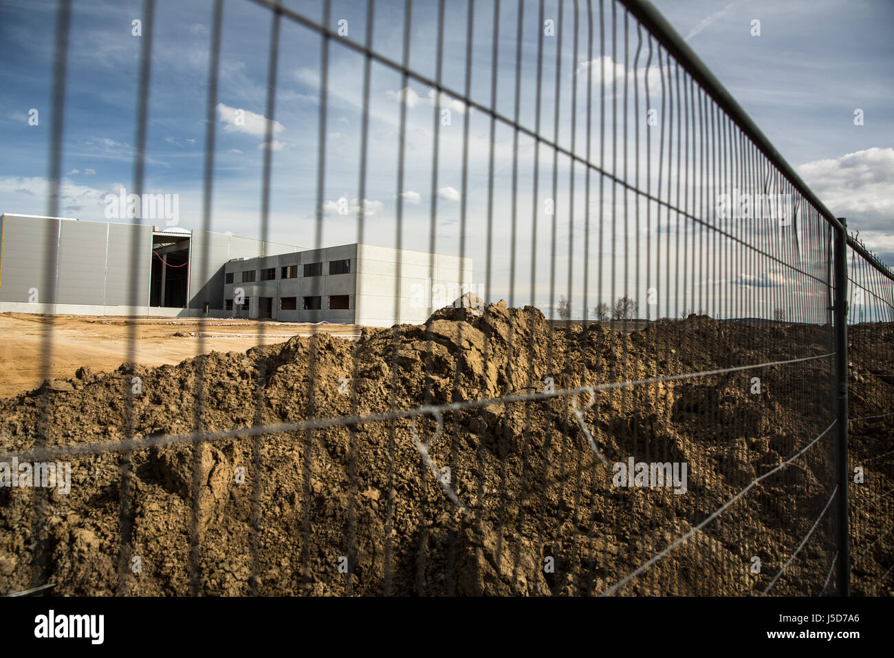 Construction site with a fence around it Stock Photo - Alamy